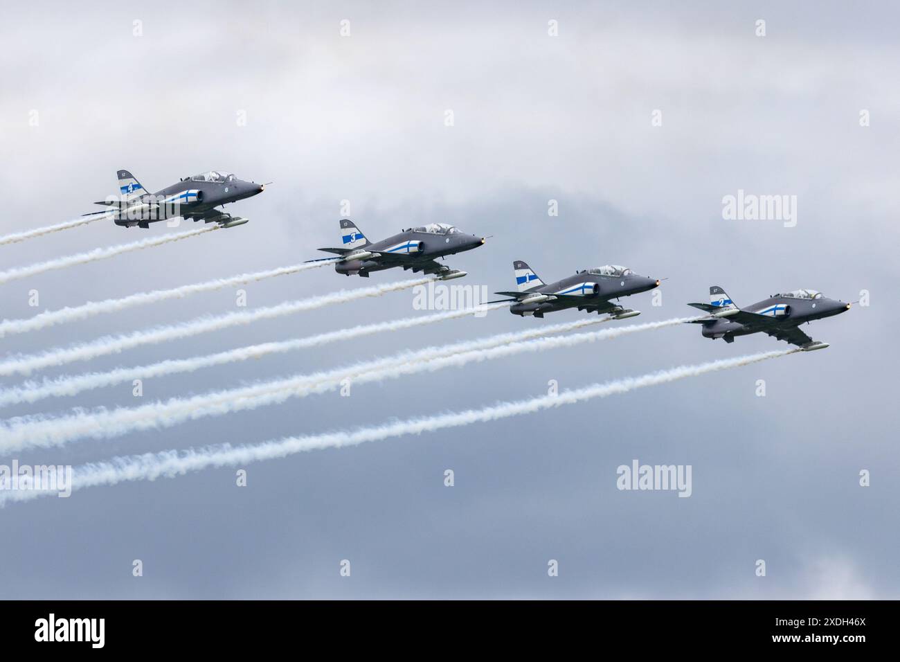 Finnish Airforce display team Midnight Hawks performing with Bae Hawk planes at an airshow in ...