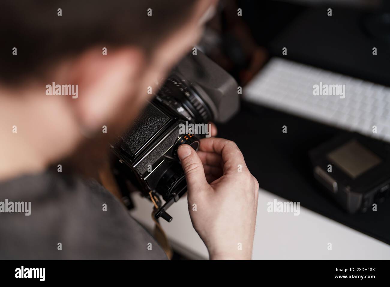 Adjusting camera settings hi-res stock photography and images - Alamy