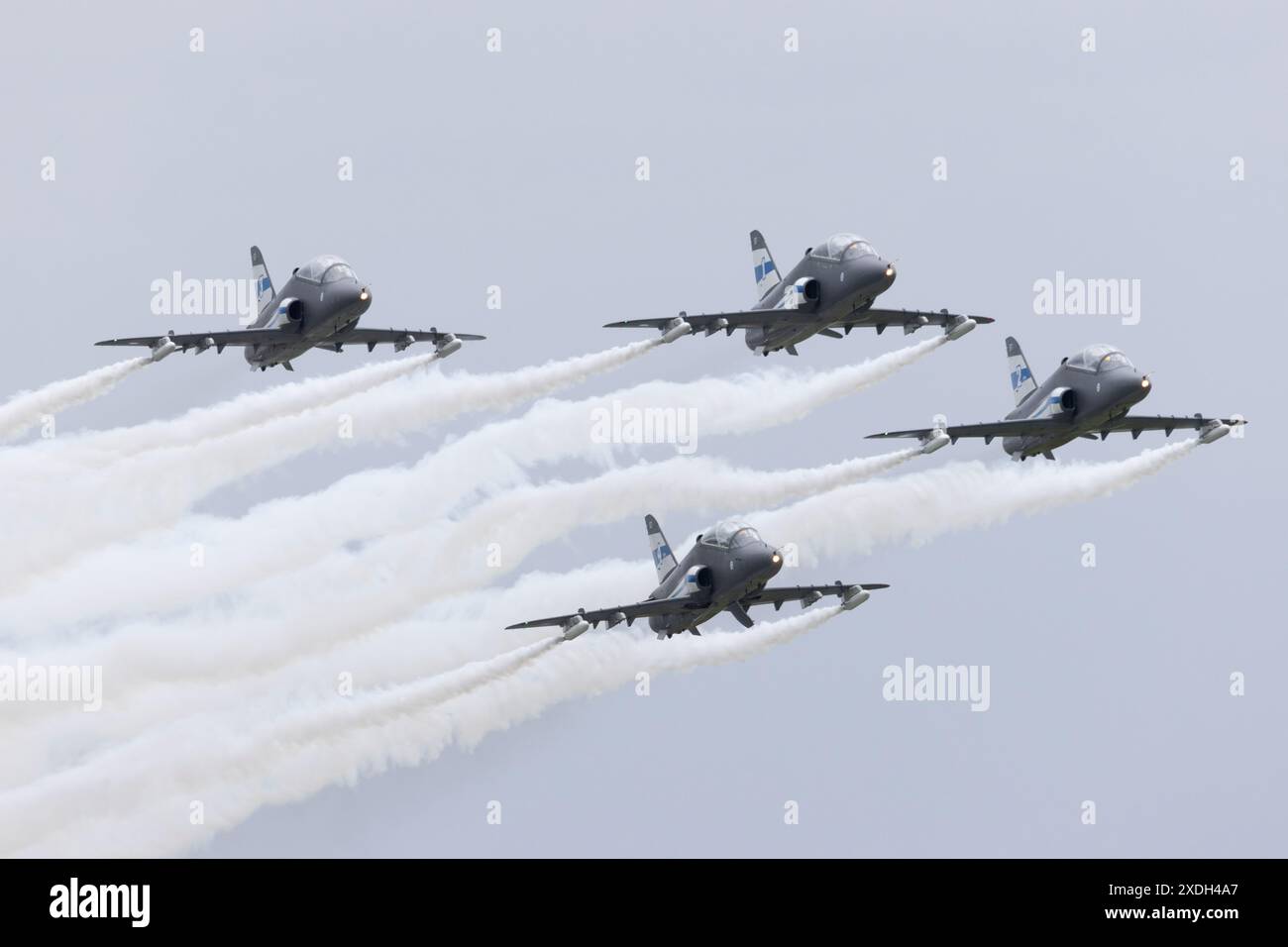 Finnish Airforce display team Midnight Hawks performing with Bae Hawk planes at an airshow in ...