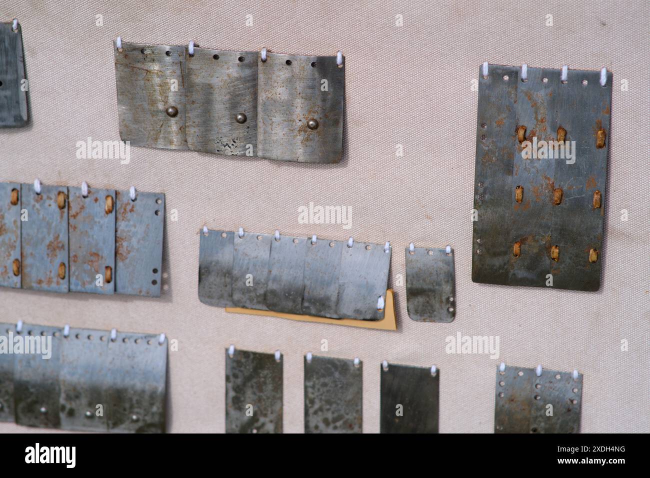 Retro plates for creating chain mail armor, close up Stock Photo - Alamy