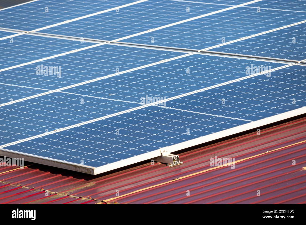 Photovoltaic panels on the roof. View of solar panels in a house on the ...