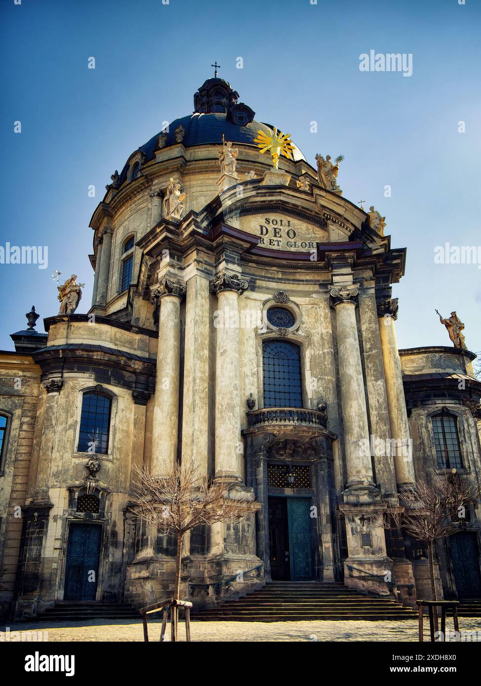 Religious Artistry: Weathered exterior of a church with ornate ...