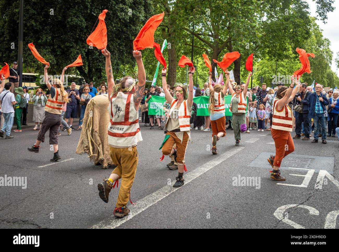 London / UK - Jun 22 2024: Activist morris dancers stage a die-in at ...