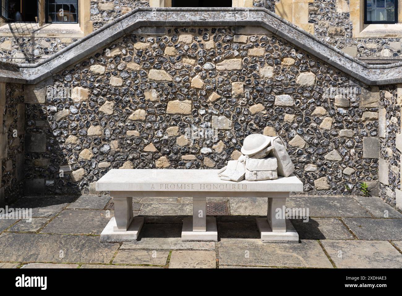 WW1 commemorative stone bench with a soldiers kit bag, water bottle ...