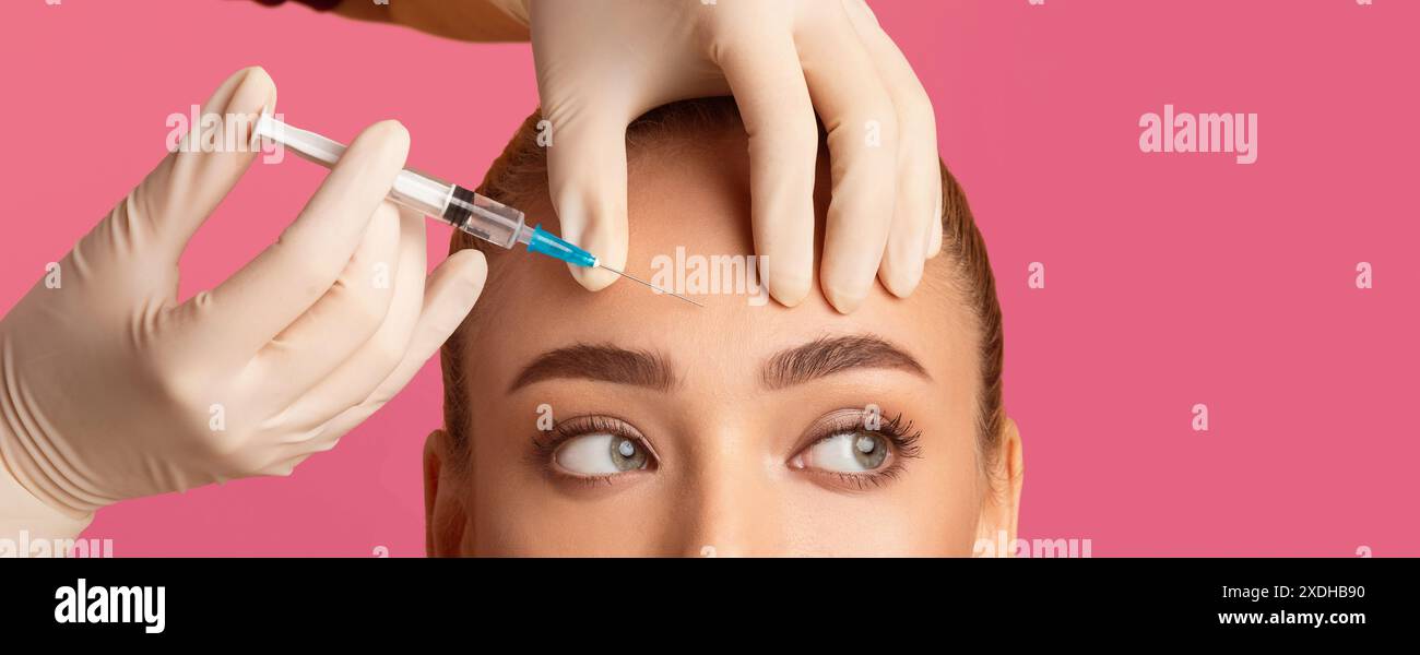 Woman Receiving Forehead Injection With Syringe and Gloved Hand Stock ...