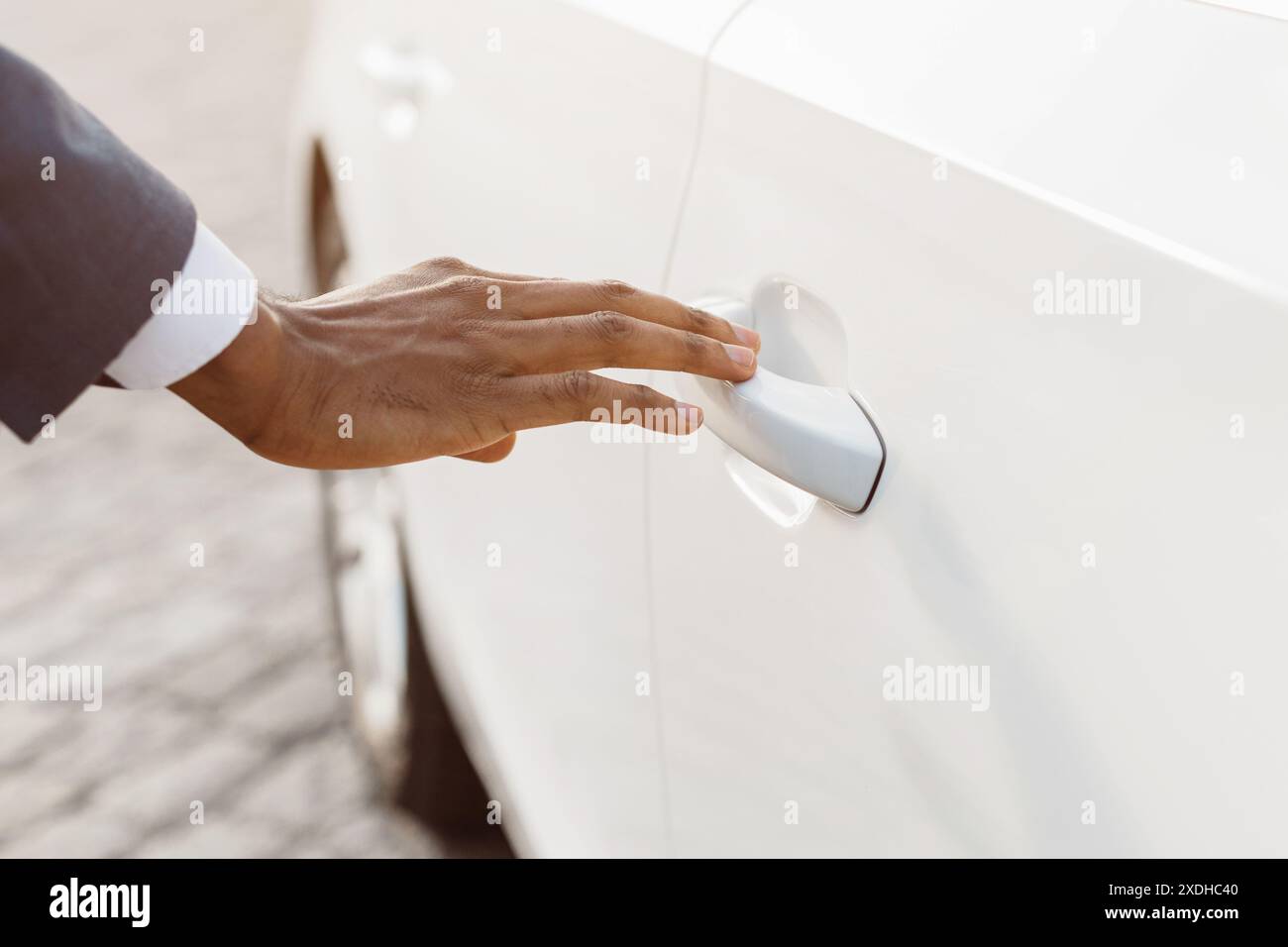 Reach for door handle hi-res stock photography and images - Alamy