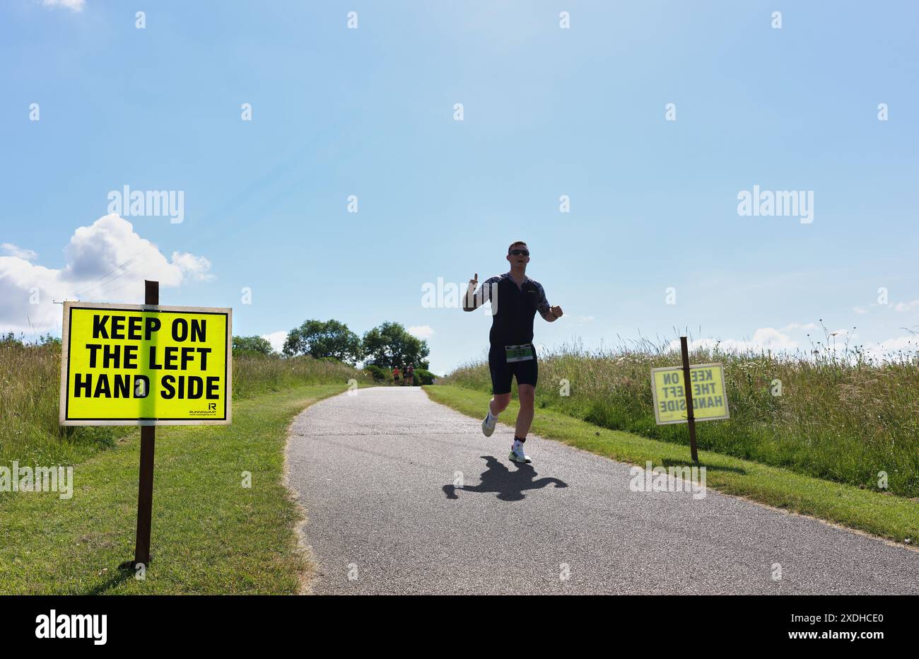 Competitor salutes whilst on a downward path during the Dambuster ...