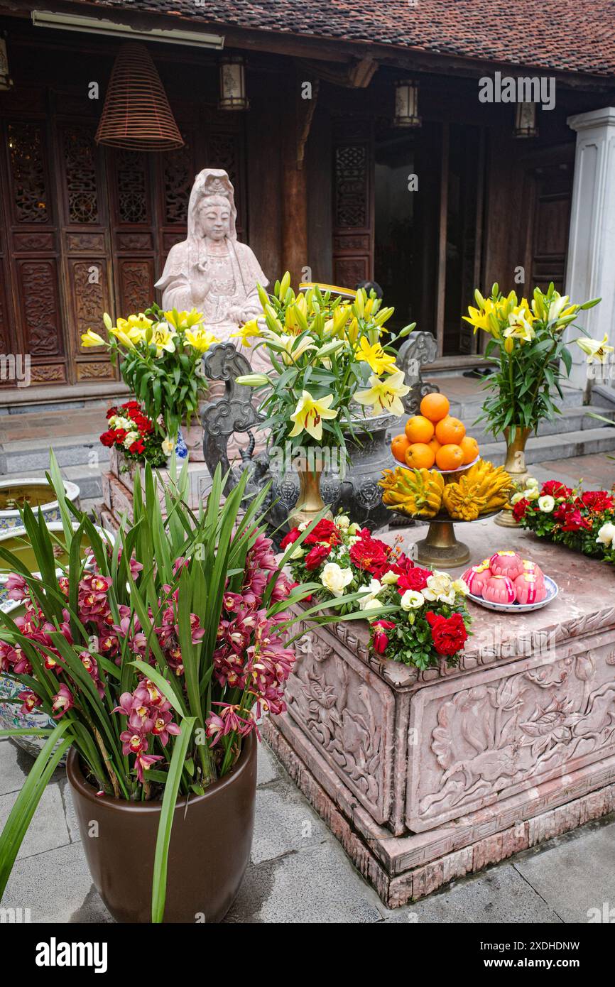 Hanoi, Vietnam - 29 Jan, 2024: Buddhist shrine at the One Pillar Pagona ...