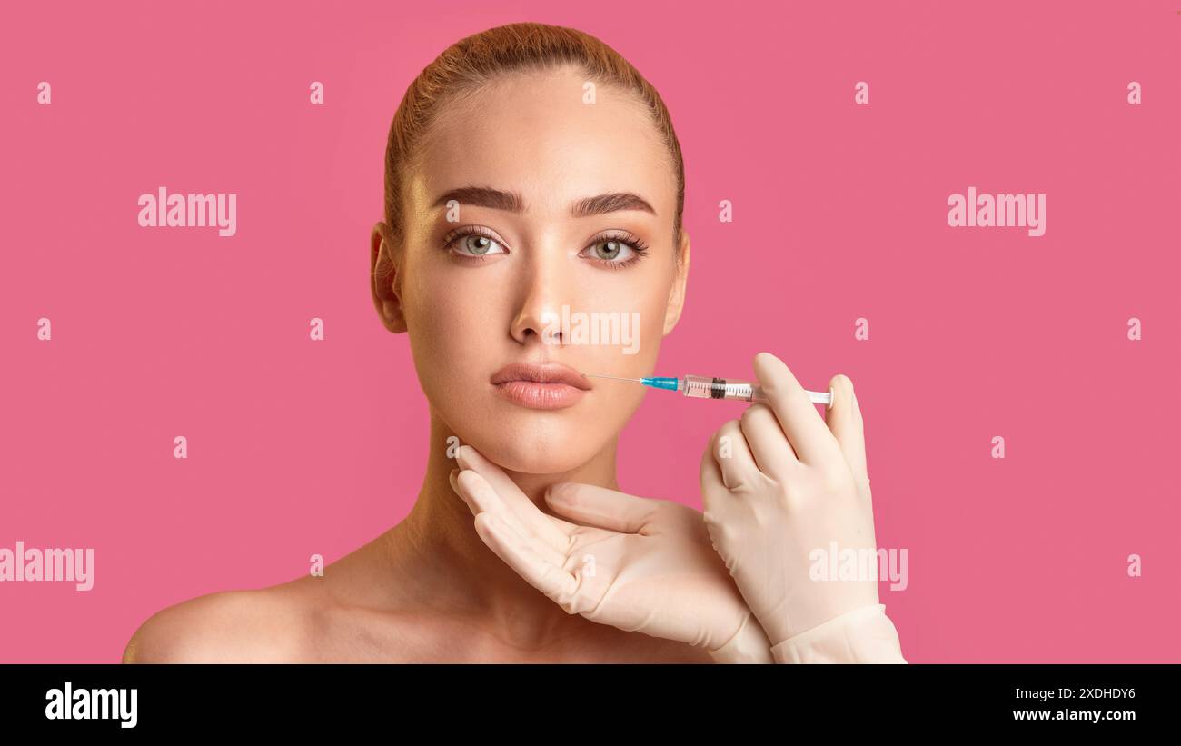 Woman Receiving Facial Beauty Injection Against Pink Background Stock ...