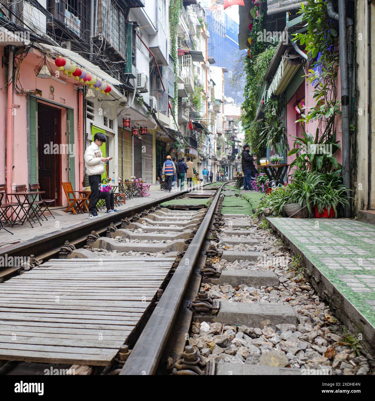 Hanoi, Vietnam - 29 Jan, 2024: Railway tracks run close to houses and ...