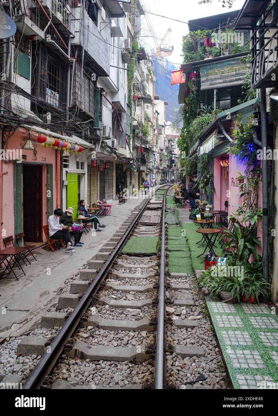 Hanoi, Vietnam - 29 Jan, 2024: Railway tracks run close to houses and ...