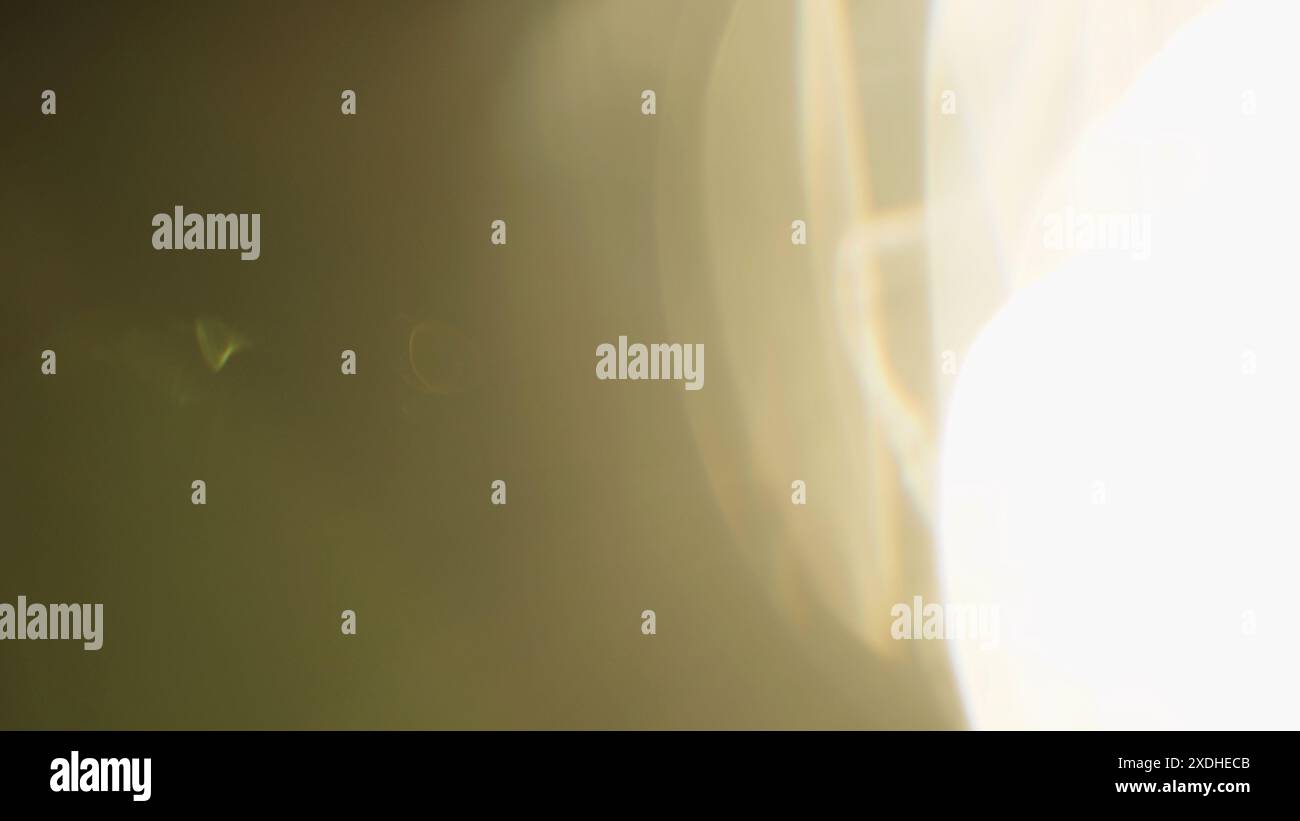 Real lens flare with strong sun backlight and light leaks , background ...