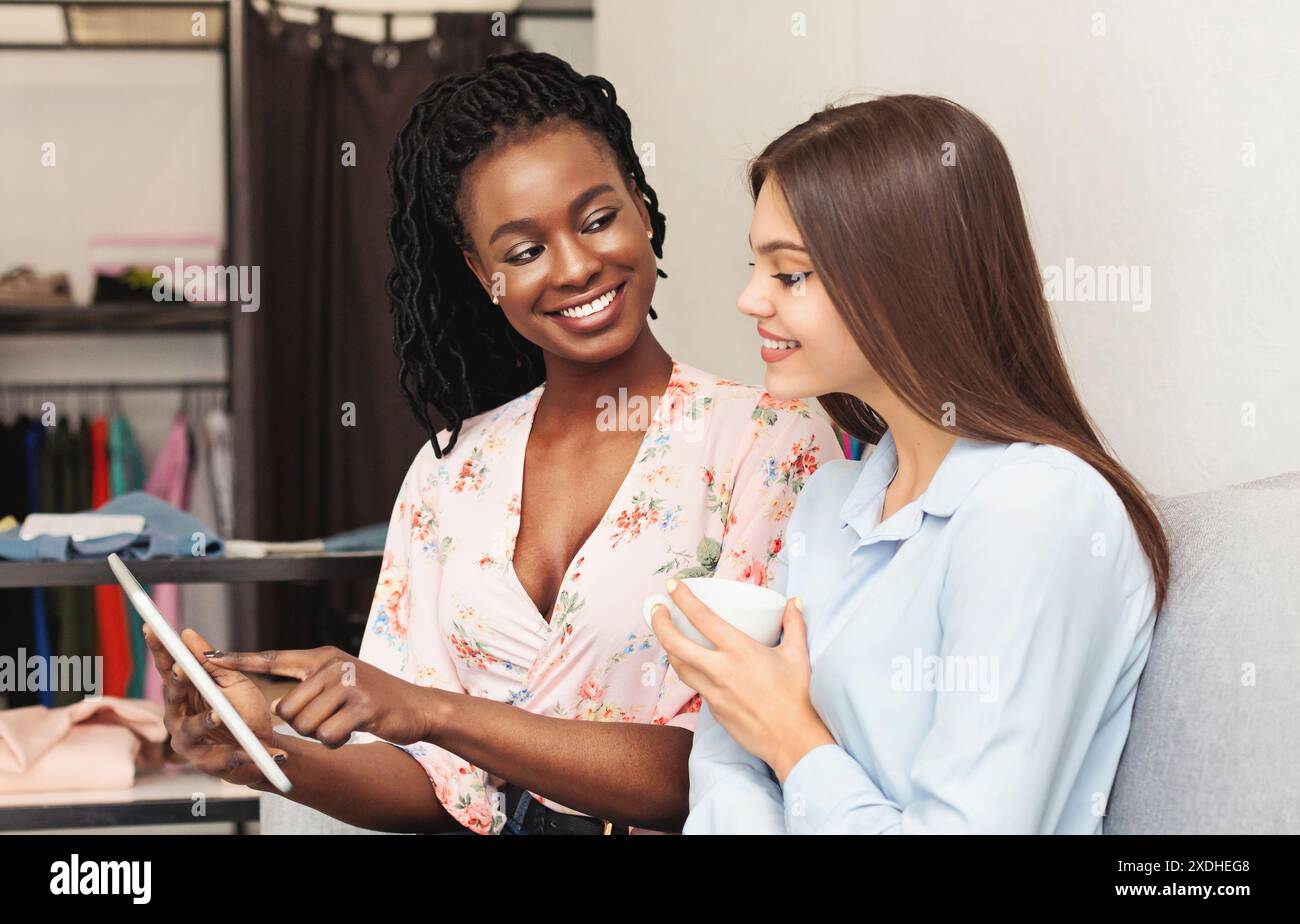 Two women standing next other hi-res stock photography and images - Alamy