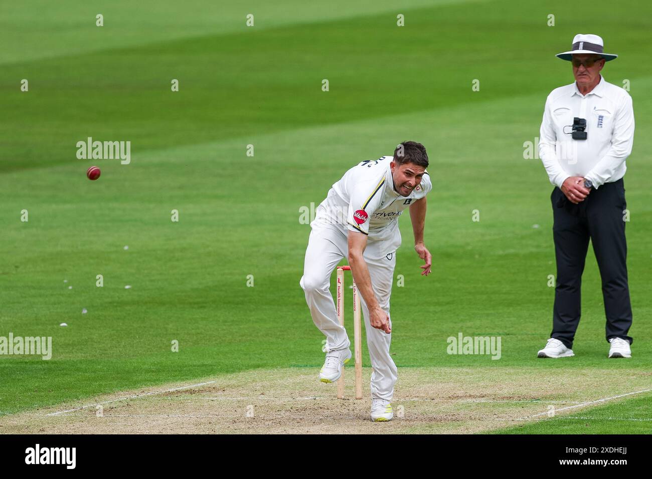 Will Rhodes in action bowling during Day 1 of the County Championship ...