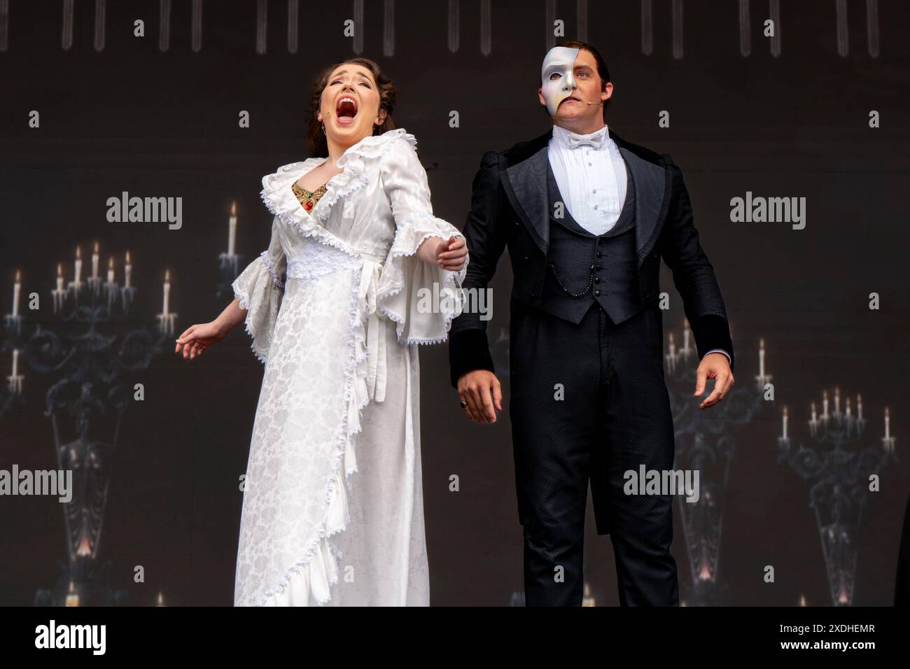 Cast of Phantom of The Opera perform in costume live on stage at West ...