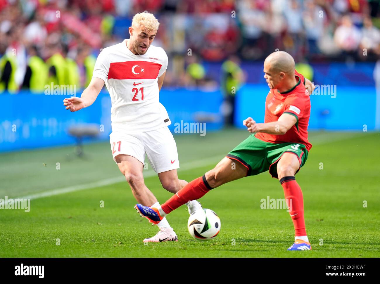 Turkey's Baris Alper Yilmaz (left) and Portugal's Pepe battle for the ...