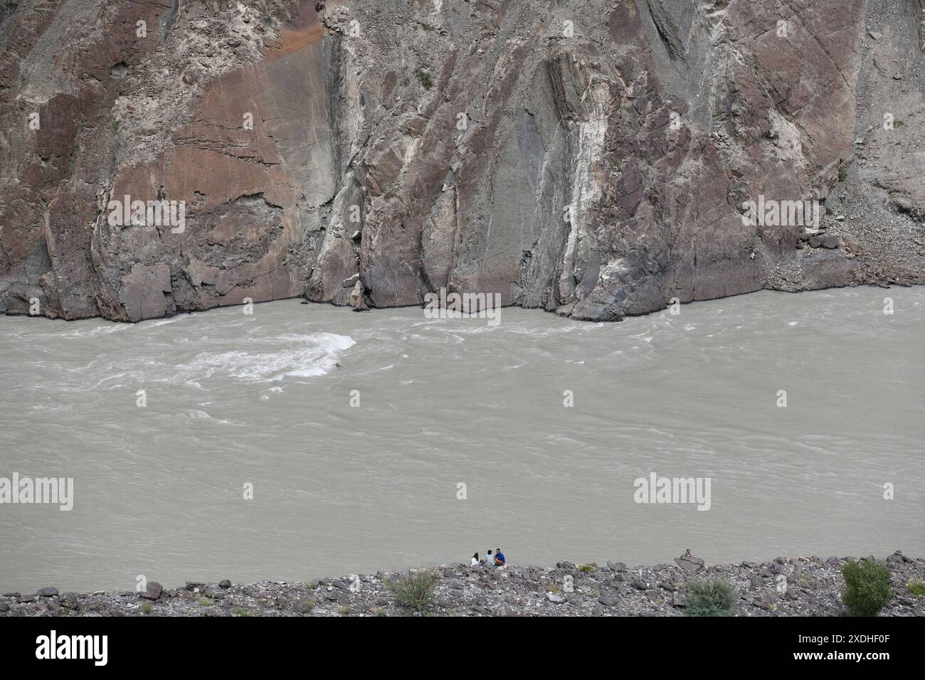 June 23, 2024, Leh, Leh Ladakh, India: People sit on the banks of Indus ...