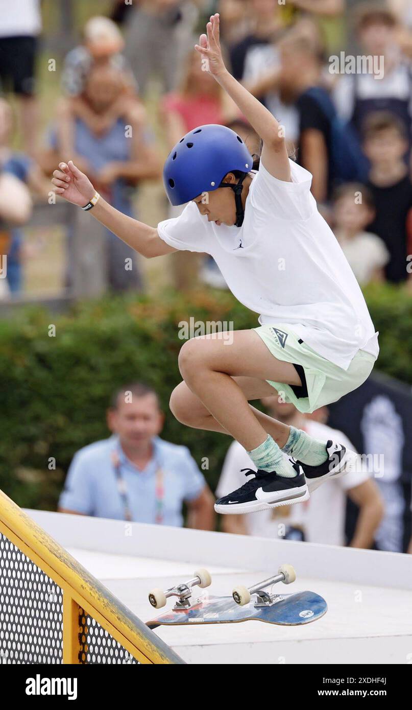 Ginwoo Onodera of Japan competes in the men's street skateboarding ...