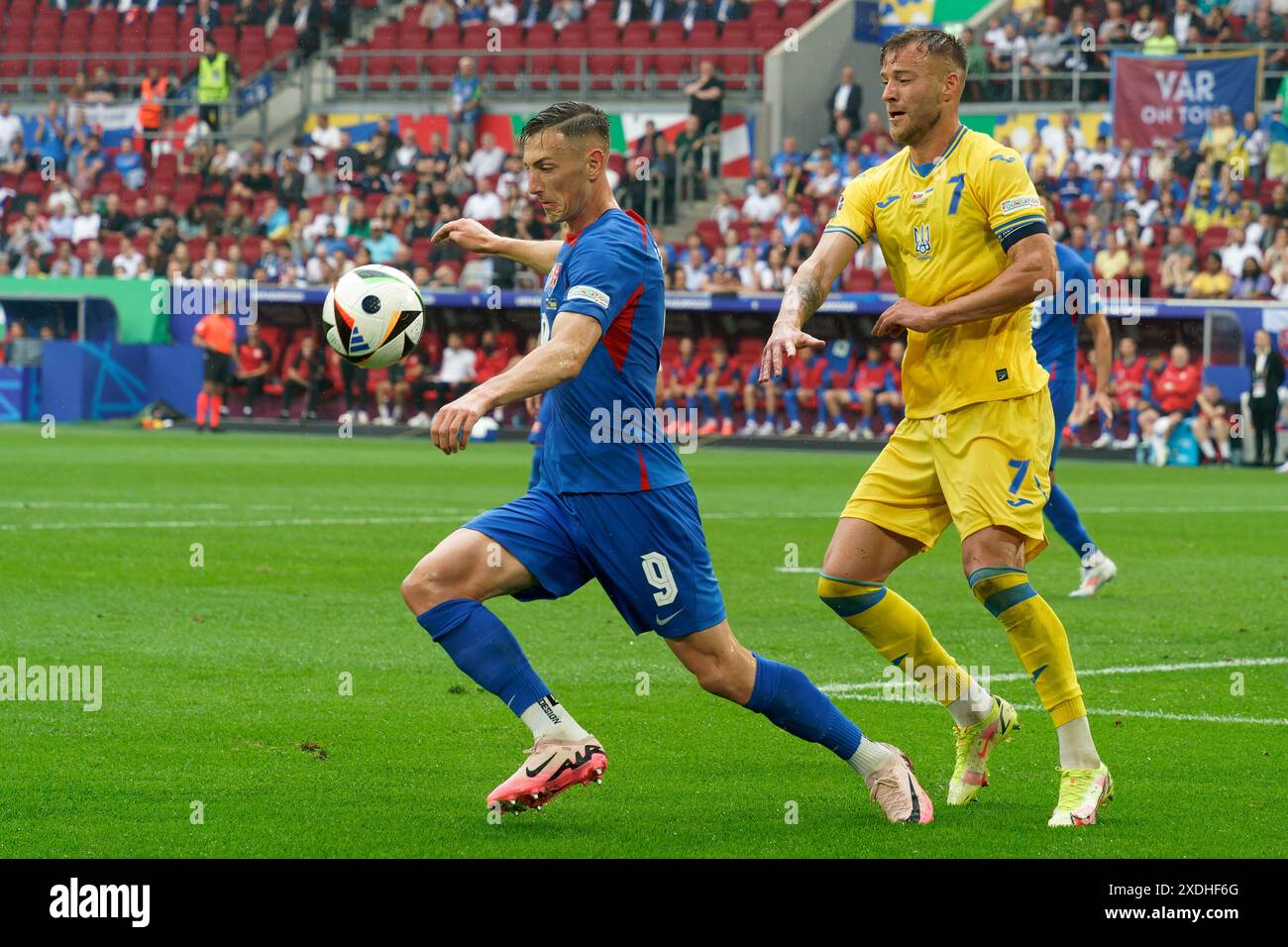 Robert Bozenik of Slovakia and Andriy Yarmolenko during UEFA Euro 2024 ...