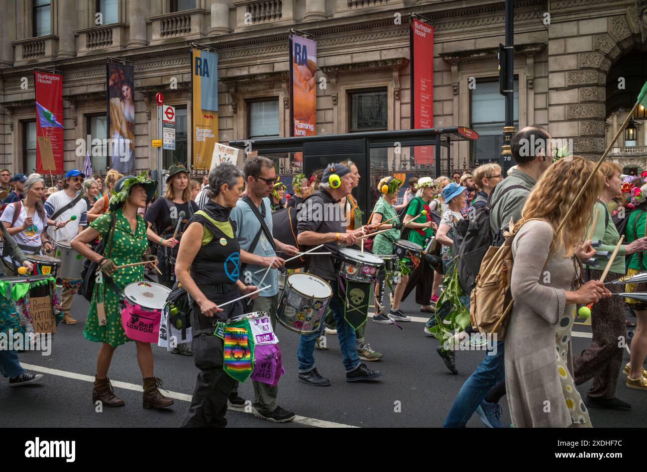 London / UK - Jun 22 2024: People play drums at the Restore Nature Now ...