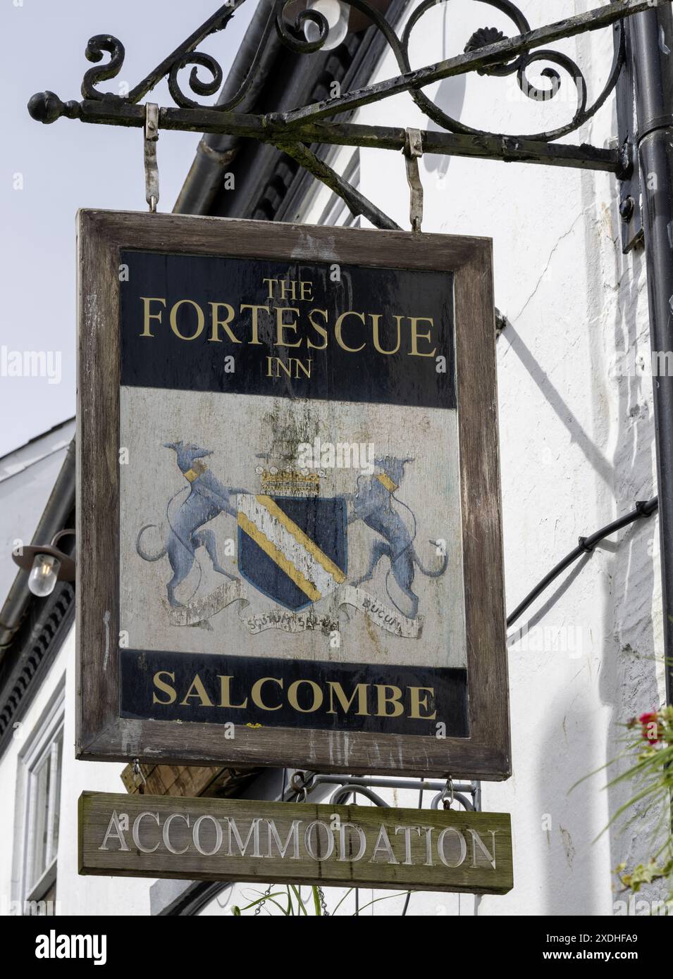 Traditional hanging pub sign at The Fortescue Inn - public house ...
