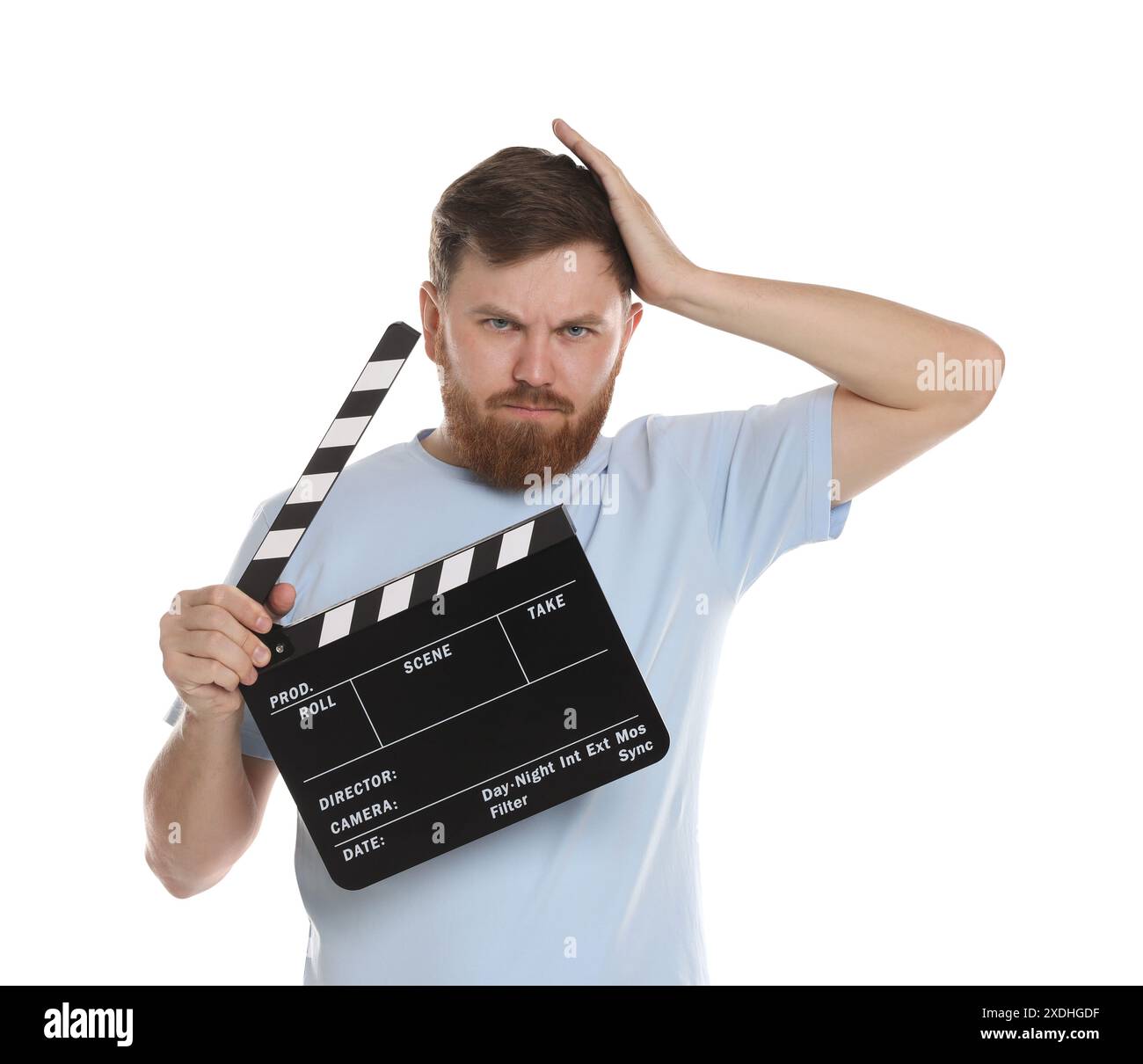 Making movie. Confused man with clapperboard on white background Stock ...