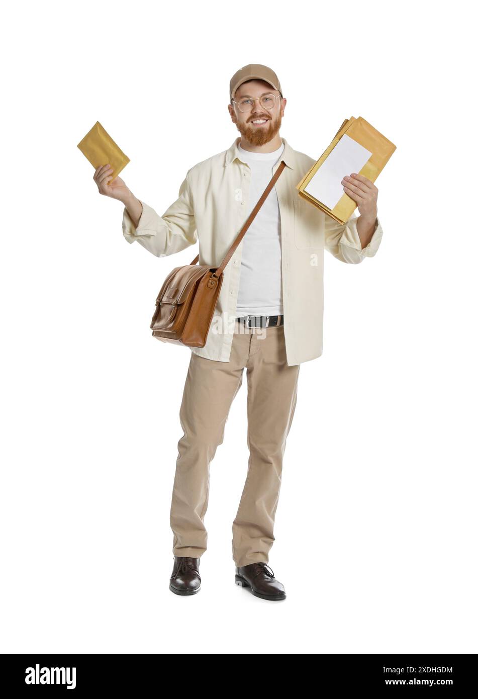 Happy young postman with brown bag delivering letters on white ...