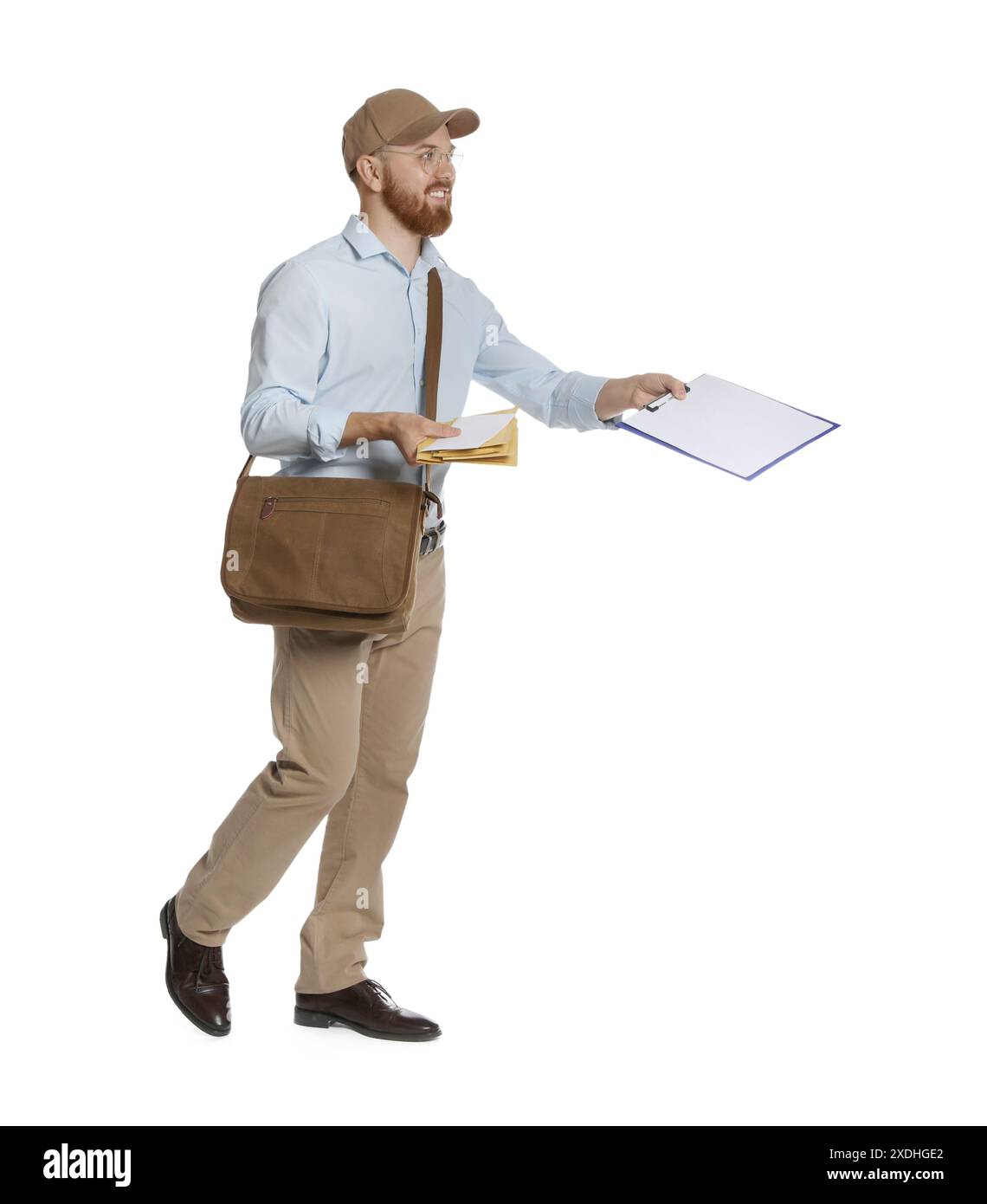 Happy young postman with brown bag delivering letters on white ...