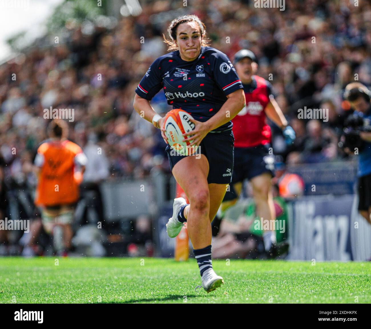 Bristol's Courtney Keight runs down the wing heading to the try line ...