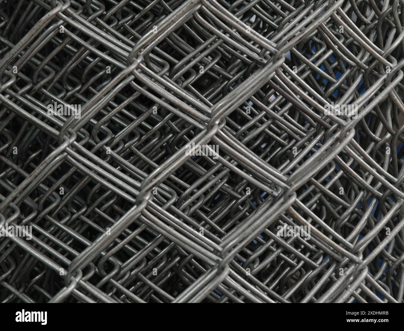 Steel chain link fence wire mesh texture and pattern Stock Photo - Alamy