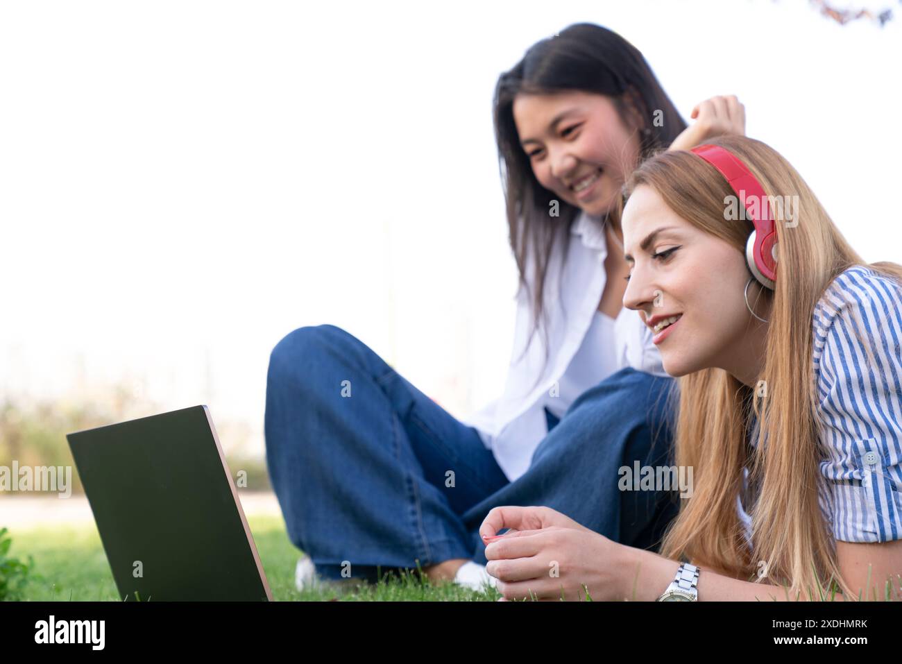 Happy young multiethnic couple spending time together at the park ...