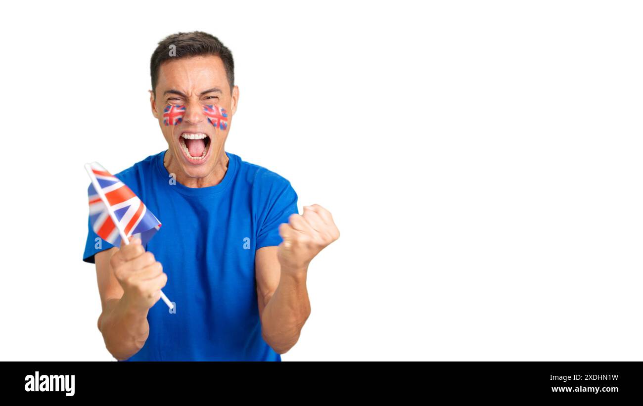 Man cheering for United Kingdom screaming and waving a national flag ...