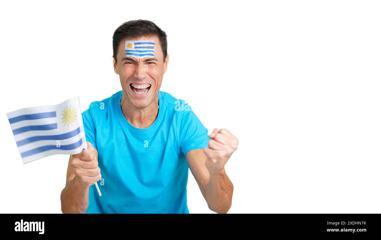 Man cheering for Uruguay screaming and waving a national flag Stock ...