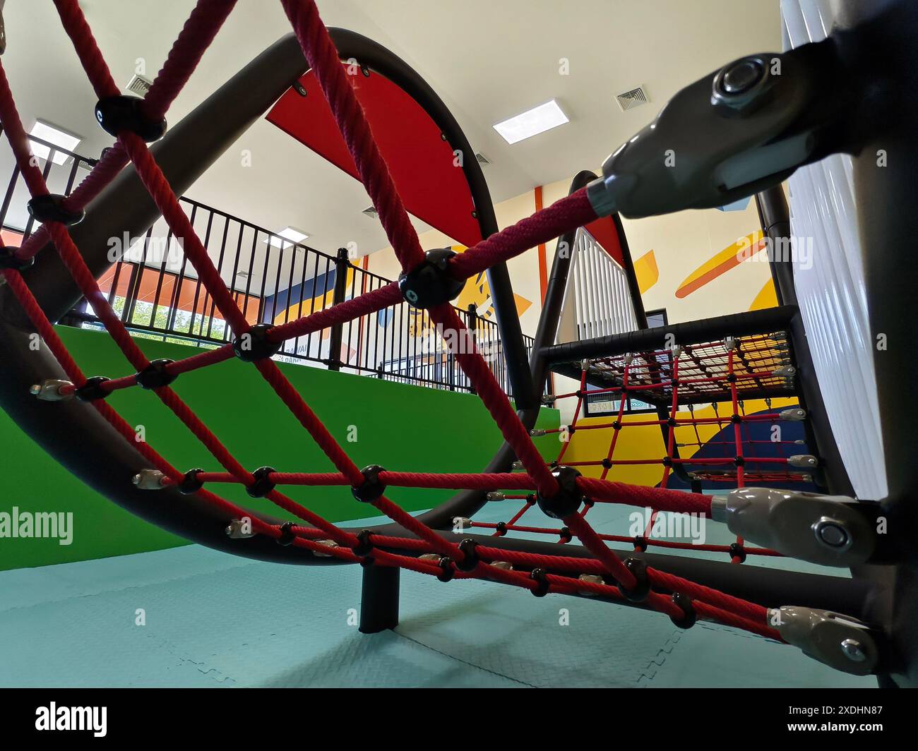 The trampoline features a mazepatterned surface for recreational use ...