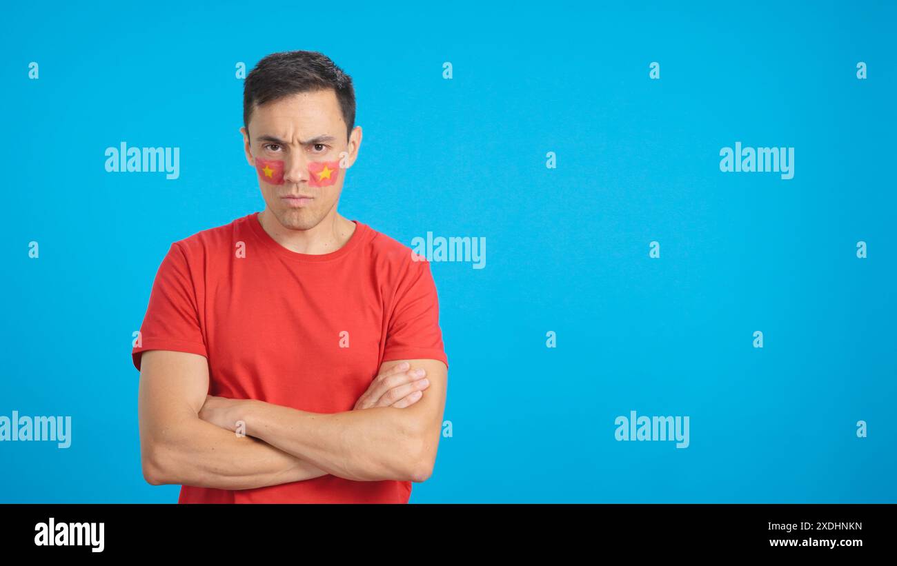 Dignified and serious man with vietnamese flag painted on face Stock ...