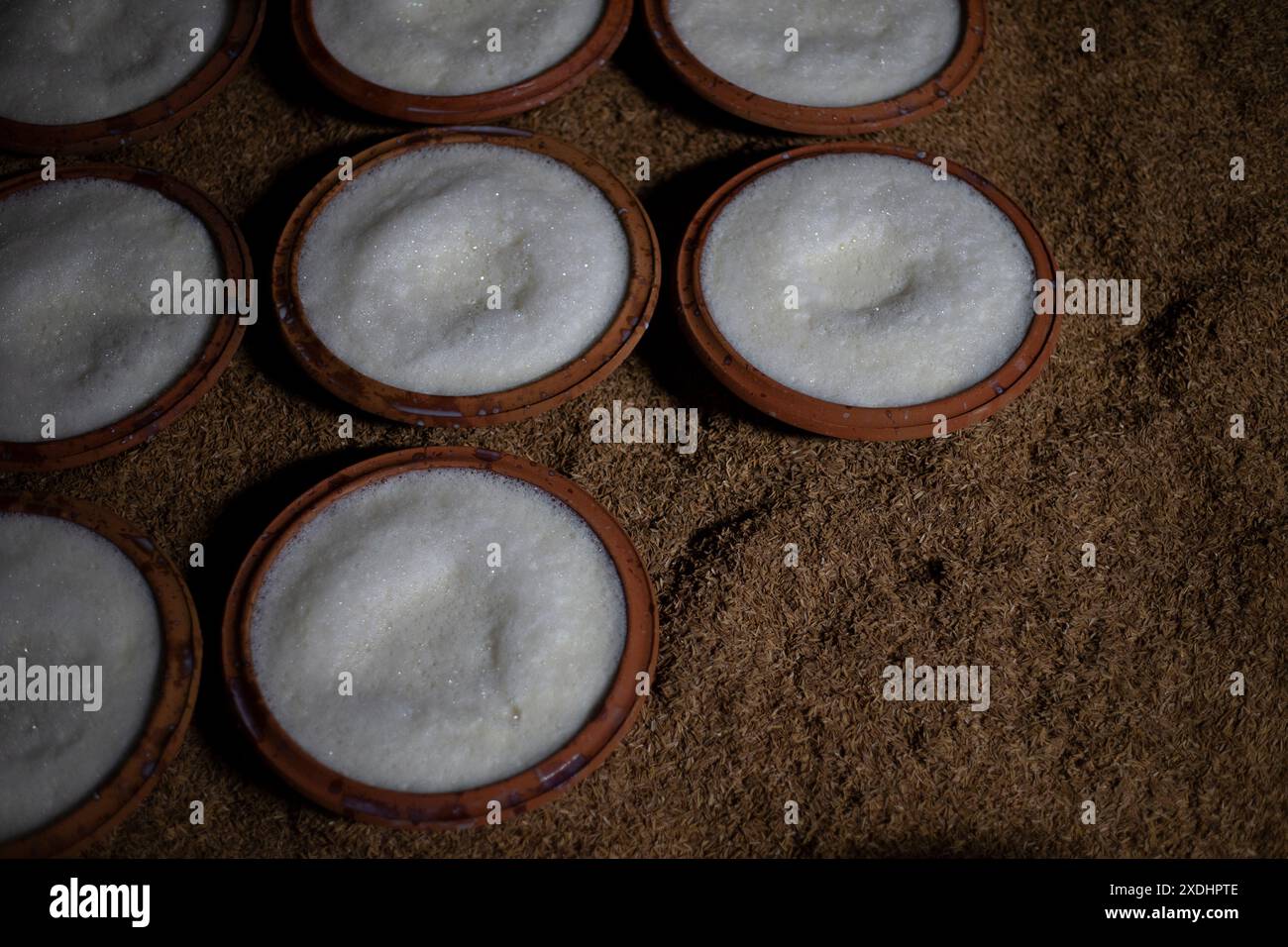 Bhaktapur, Nepal. 23rd June, 2024. Yogurt in the earthenware containers ...