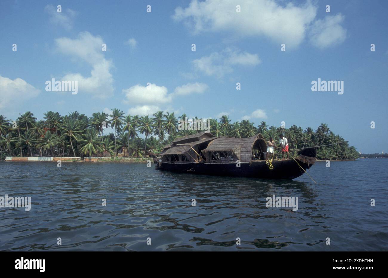 a traditional Kerala Houseboat in a Canal in the Lagoons and Backwater ...