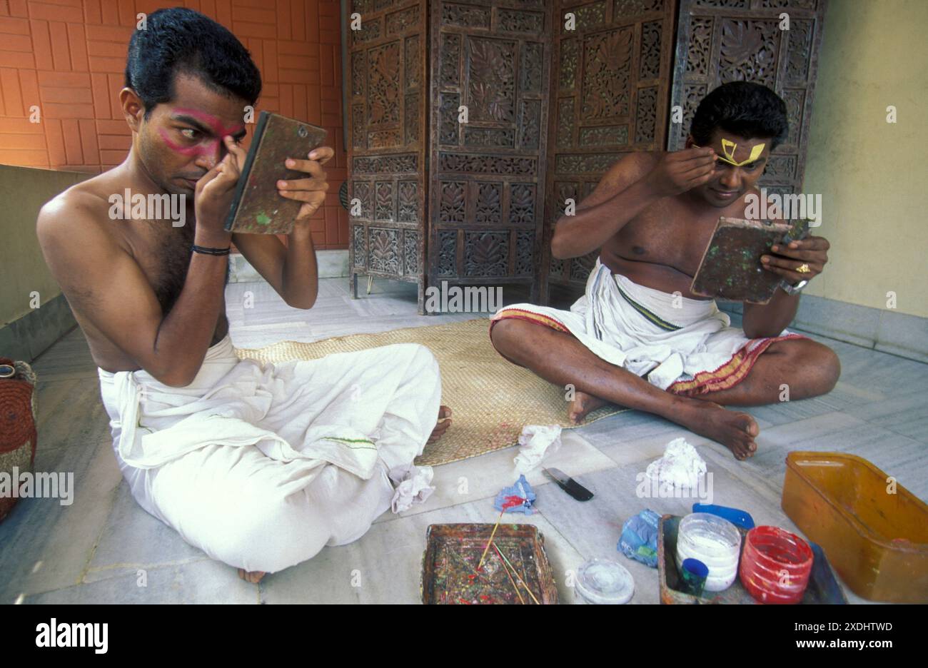 Artists at preparations get ready of a Kathakali Dance Group at a ...