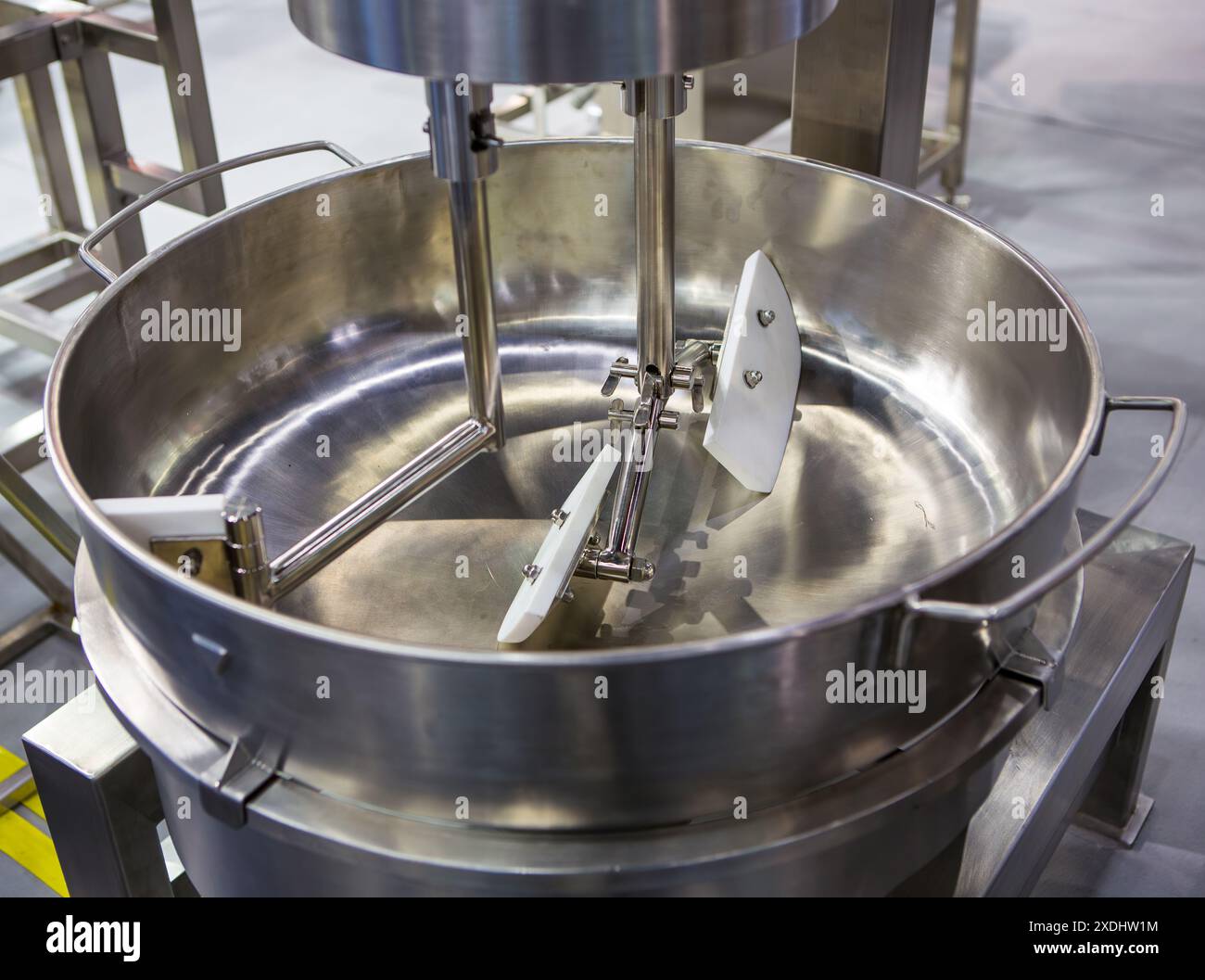 Blender machine large barrel mixing food ingredient. Food industry ...