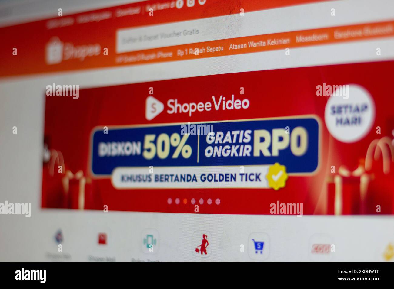 Shopee application on computer monitor Shopee is one of the online ...