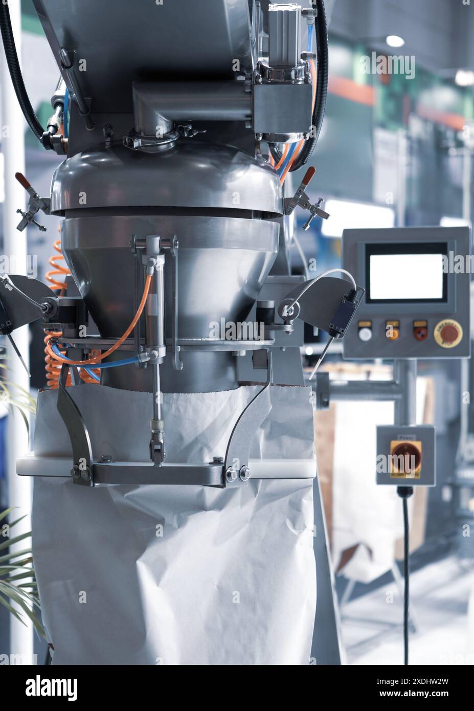 Food raw materials filling and packing in sack bags Stock Photo - Alamy