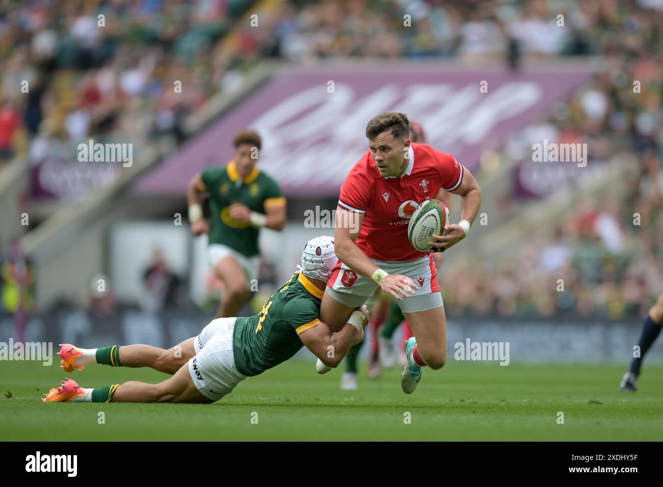 Edwill van der Merwe of South Africa makes an important tackle on Mason ...