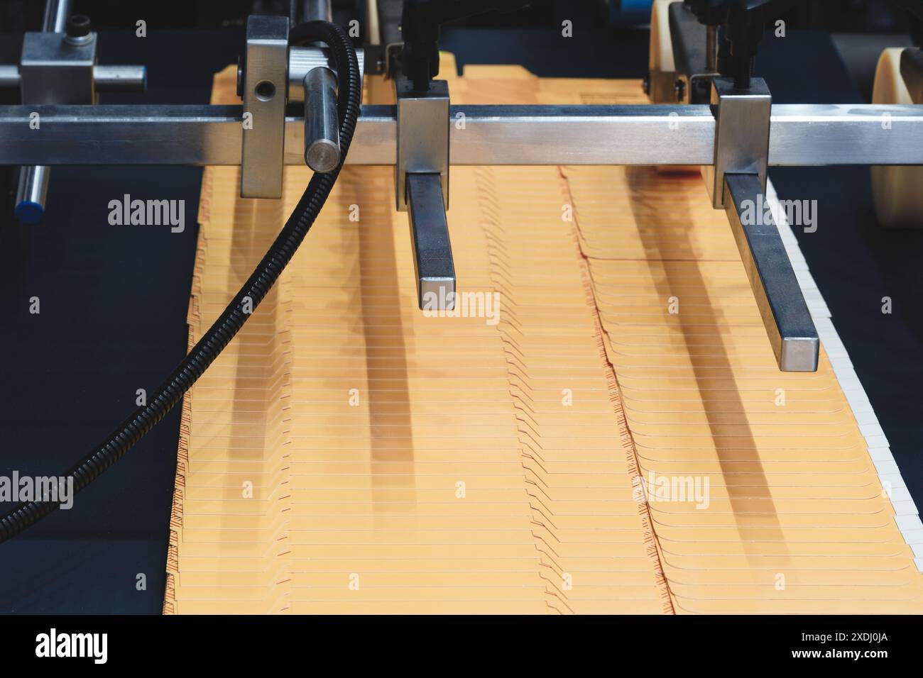 line of assembly of cardboard packaging in boxes and finished products ...