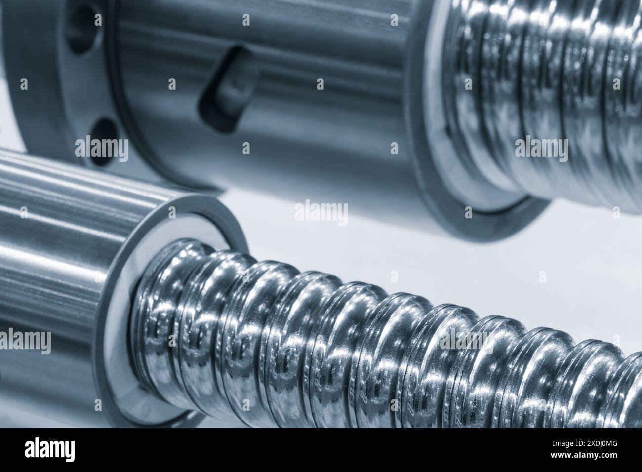 Metal screw drive with threaded shaft and bushing, industrial concept ...