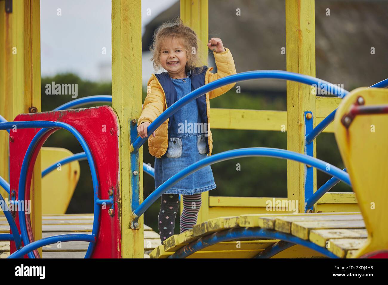 Charming child playing on a playground in Denmark Stock Photo - Alamy