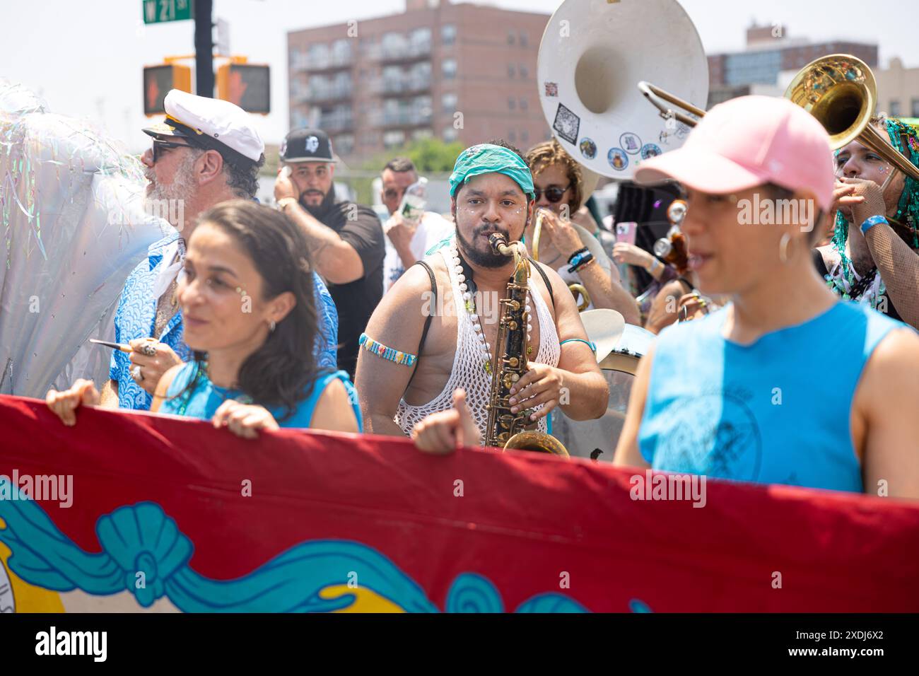 Participants of the 42nd Annual Mermaid Parade perform at Coney Island ...