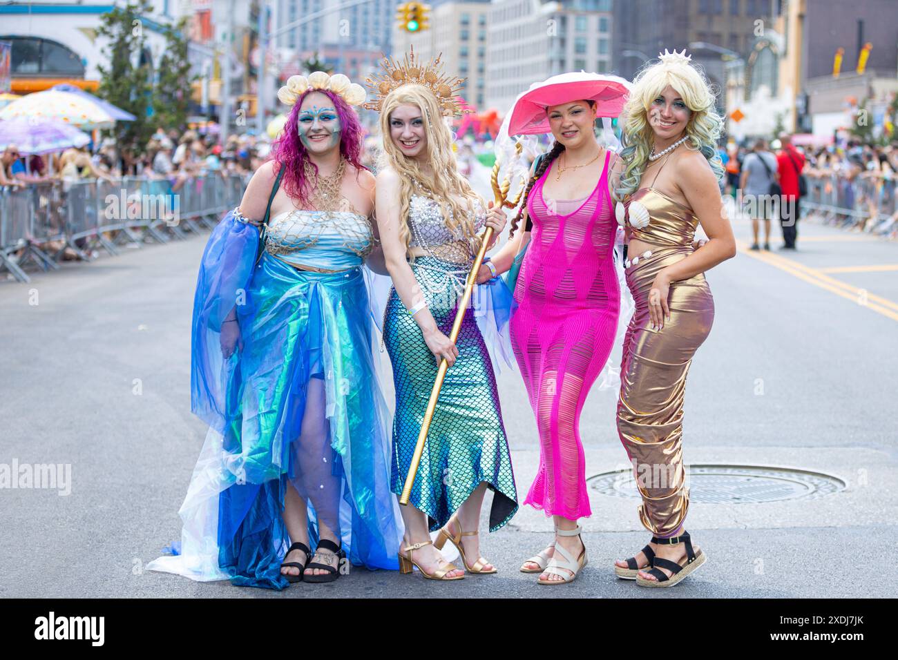 Participants of the 42nd Annual Mermaid Parade at Coney Island pose for ...