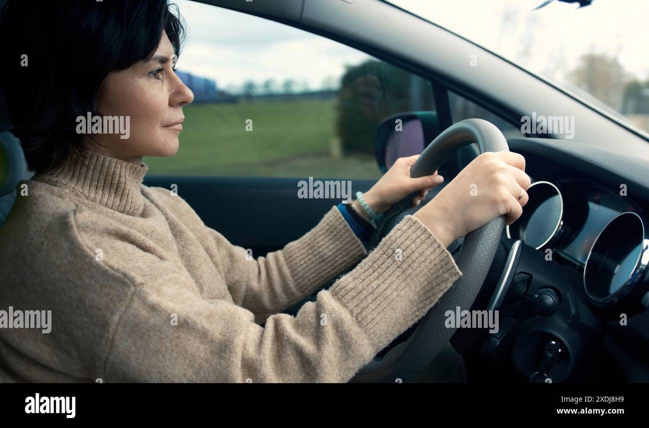Serene Woman Driving Her Car Through The Countryside, Female Driver ...