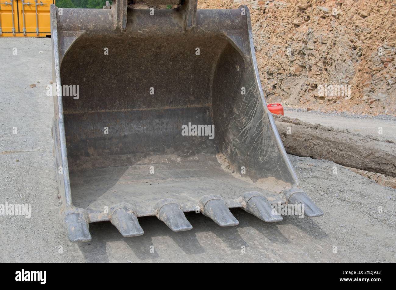 Large bucket on an excavator on a construction site Stock Photo - Alamy