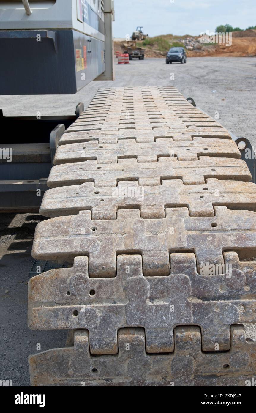 Closeup looking over metal track of heavy equipment Stock Photo - Alamy